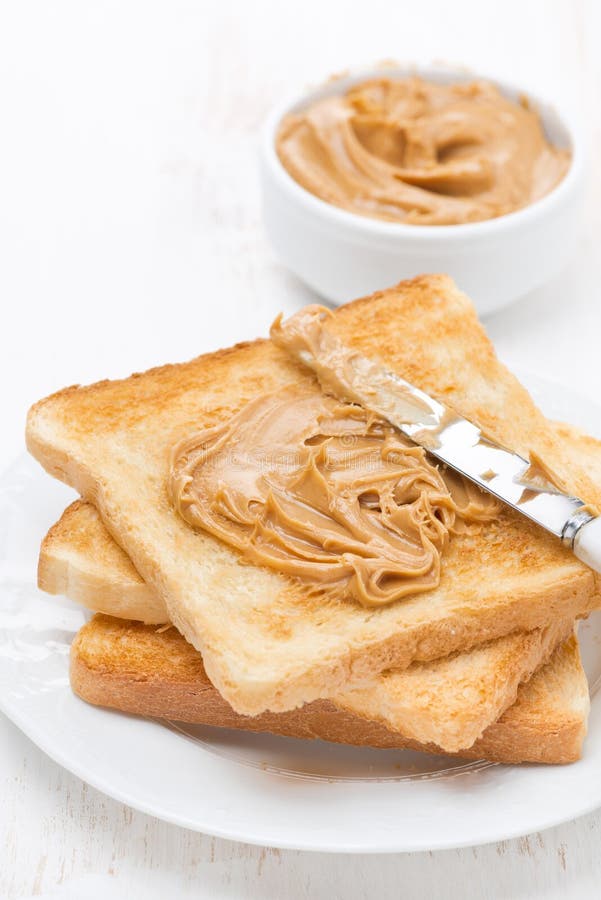 Toast With Peanut Butter, Vertical Stock Image - Image of fried ...