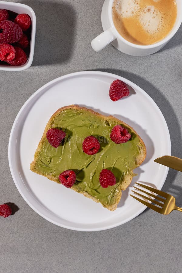 Toast with Pistachio Paste and Strawberries, Top View Stock Photo ...