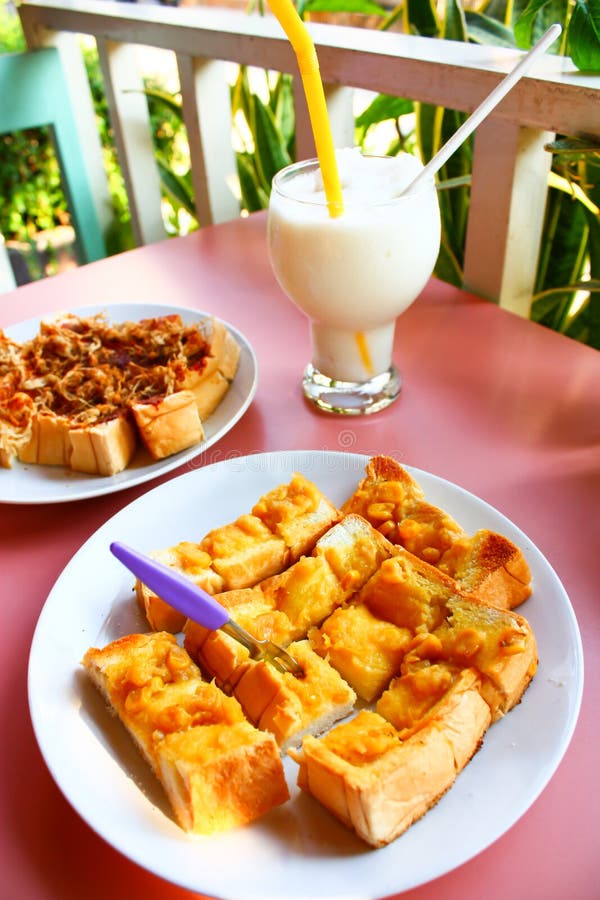 Toast on a plate with fork stock image. Image of white - 29479815