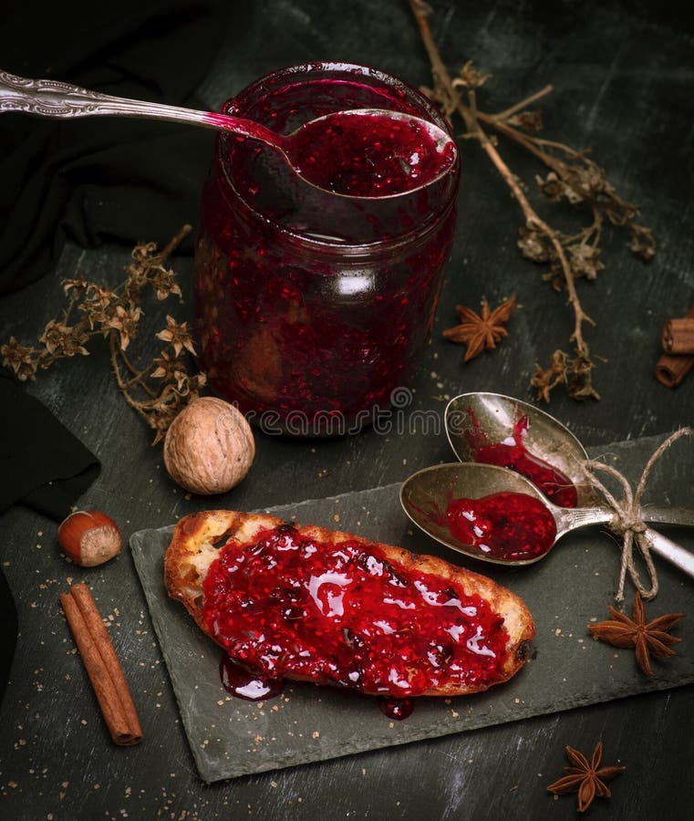 Toast with Raspberry Jam and Empty Jam Jar Stock Photo - Image of ...