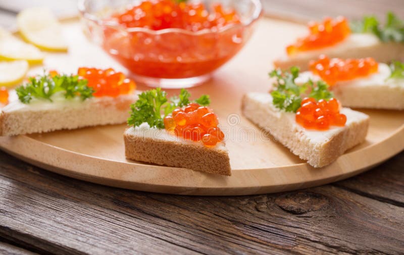 Toast with Red Caviar on Tray Stock Photo - Image of lunch ...