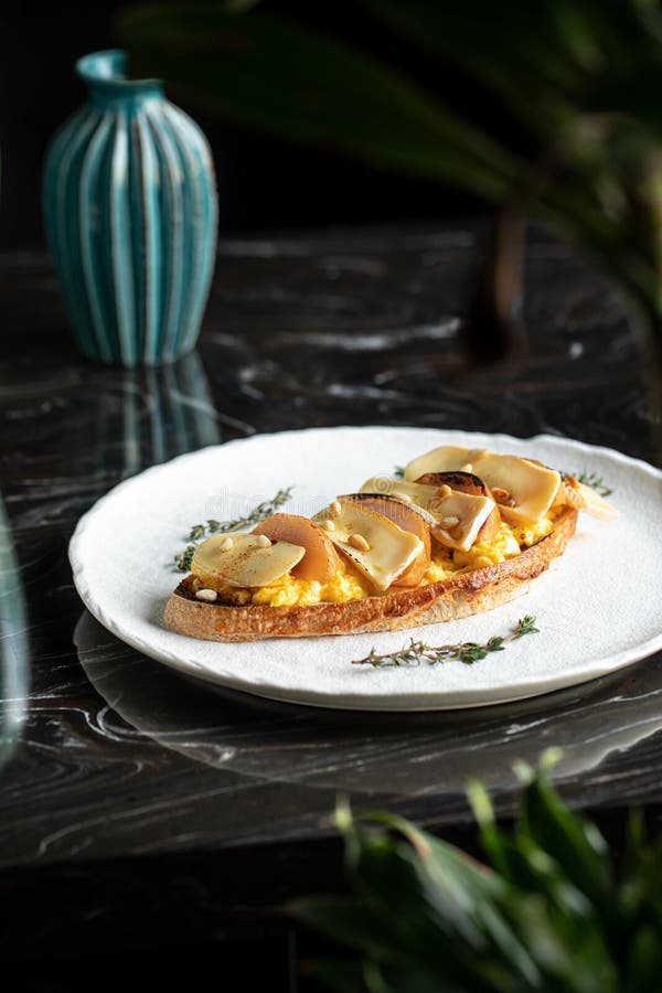 Toast with Scrambled Egg Pear and Brie Stock Image - Image of plate ...