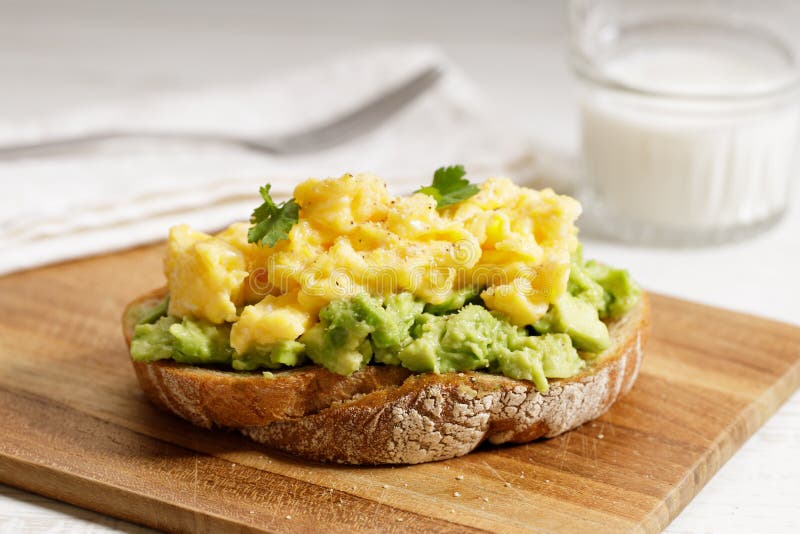 Toast with Smashed Avocado and Scrambled Egg Stock Image - Image of ...
