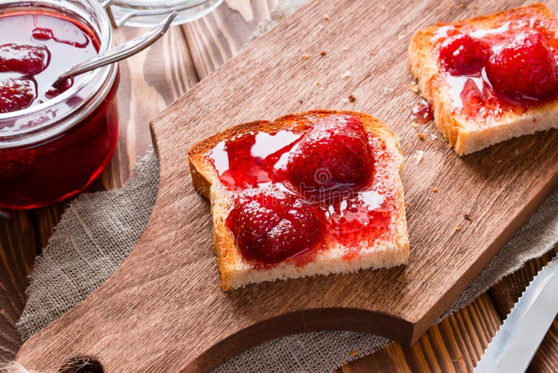 Toast with strawberry jam stock photo. Image of fresh - 62358660
