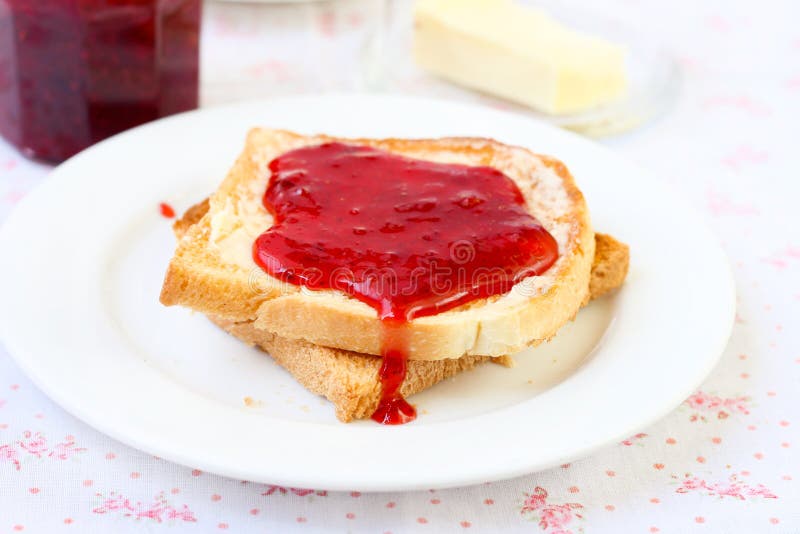 Toast with strawberry jam stock image. Image of preserves - 31657001