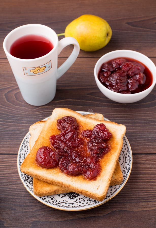 Toast with strawberry jam stock photo. Image of marmelade - 33764684