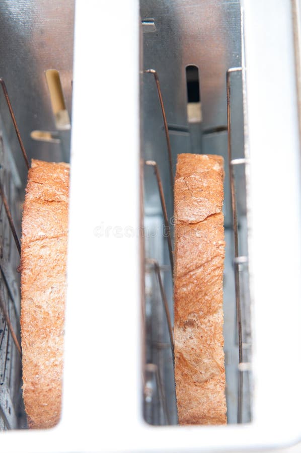 Toast in toaster stock image. Image of background, wheat - 59545813