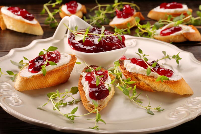 Toast with White Cottage Cheese Cherry Jam and Fresh Herbs Stock Photo ...