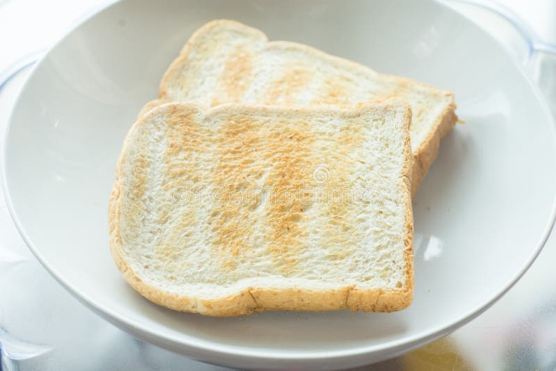 Toast stock image. Image of dark, brown, toast, plate - 66232375
