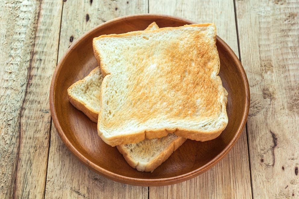 Toast in wood dish stock photo. Image of sandwich, wood - 55882360