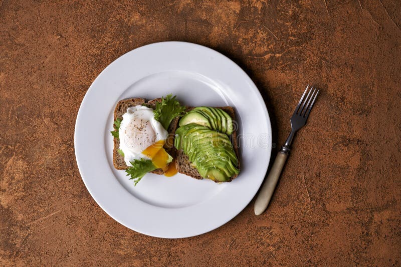 Toasta with Avocado and Egg Stock Photo - Image of poached, sliced ...