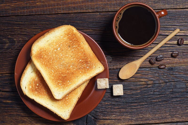 Toasted bread and coffee stock photo. Image of slice - 63470920