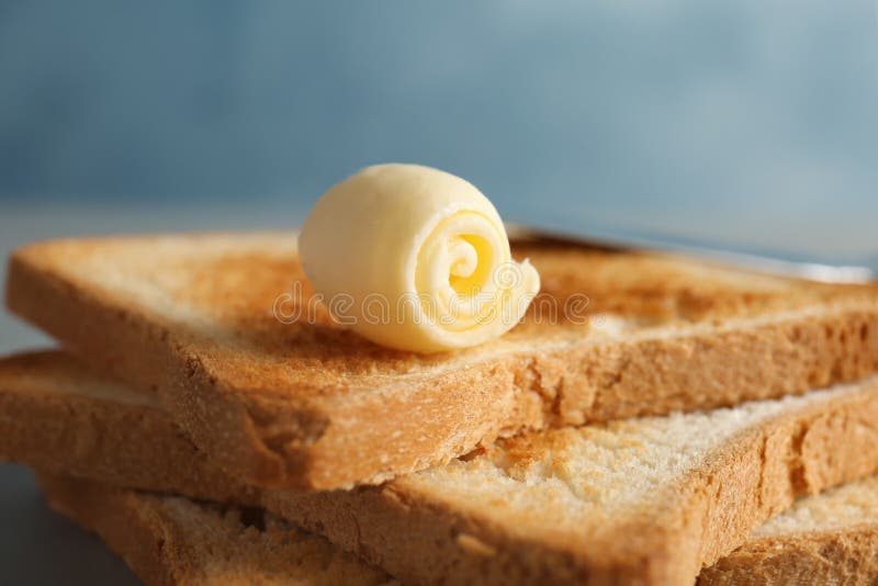 Toasted Bread with Fresh Butter Curl, Stock Photo - Image of curl ...