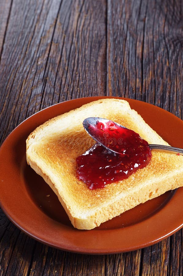 Toasted bread with jam stock image. Image of table, crust - 63360207