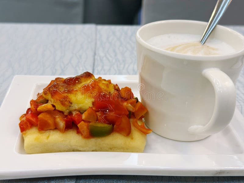 Slices of Toasted Bread with Vegetables on a White Plate Stock Photo ...