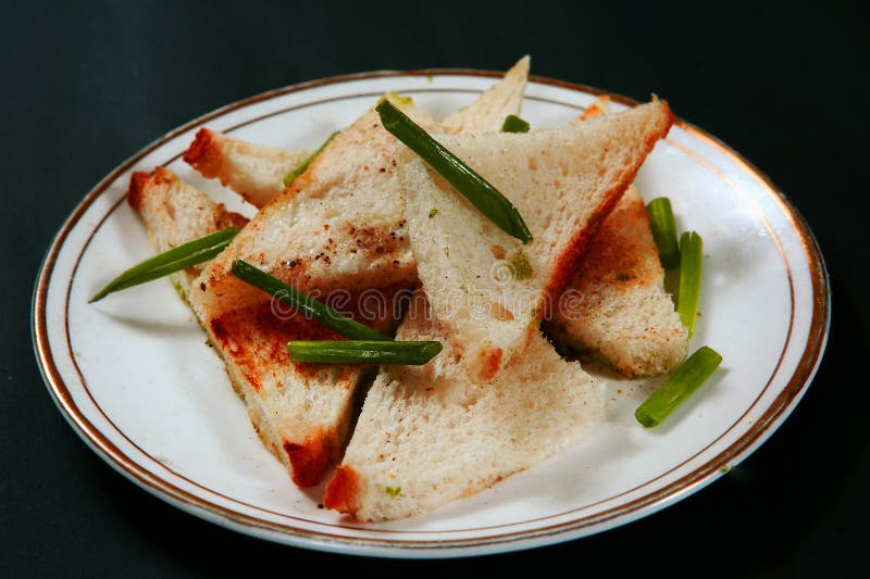 Toasted Bread Triangles. with Fresh Green Onion Garnish. Triangular Cut ...