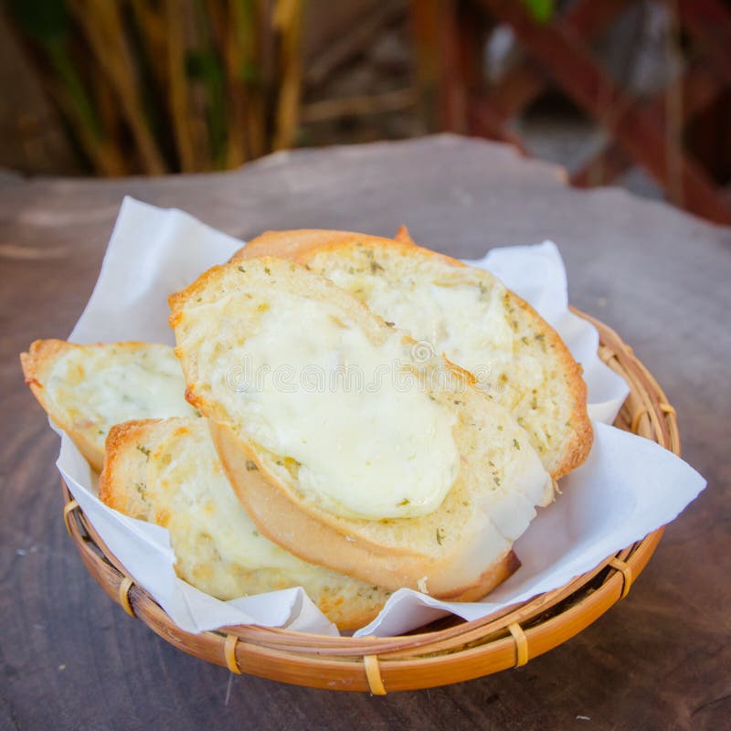 Toasted Cheese and Garlic Bread Stock Photo - Image of bruschetta, wood ...