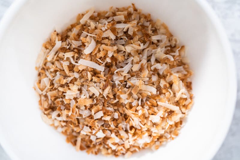 Toasted coconut stock photo. Image of bowl, coconut - 282246162