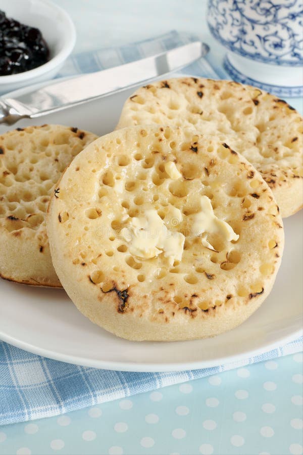 Toasted crumpets stock photo. Image of knife, english - 39697422