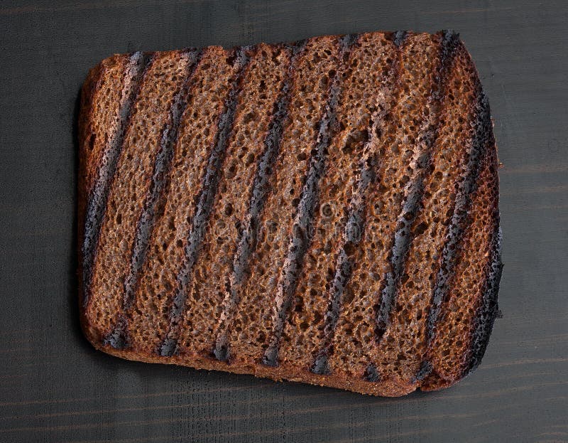 Toasted Custard Rye Bread on the Wooden Table Stock Image - Image of ...