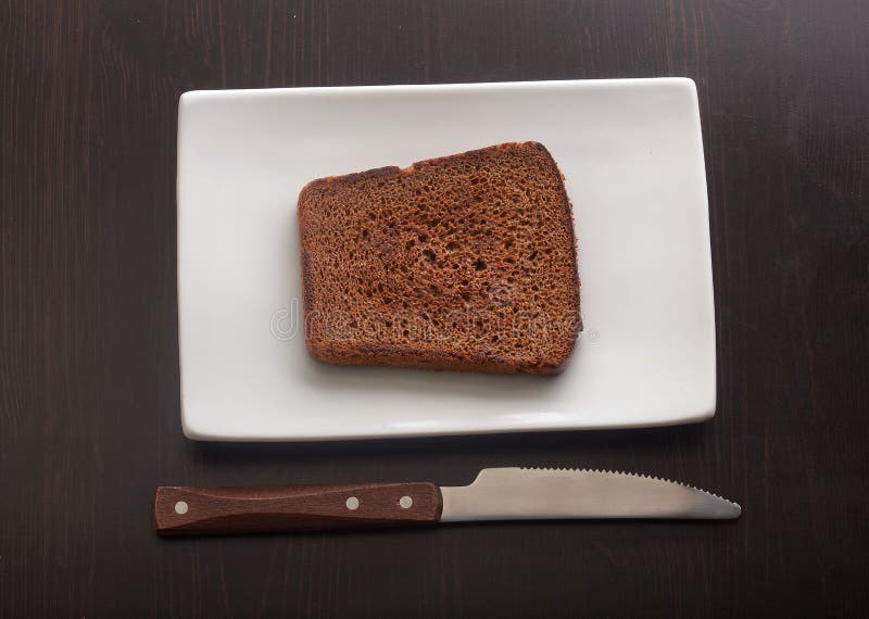 Toasted Rye Bread on the White Plate Stock Image - Image of black ...