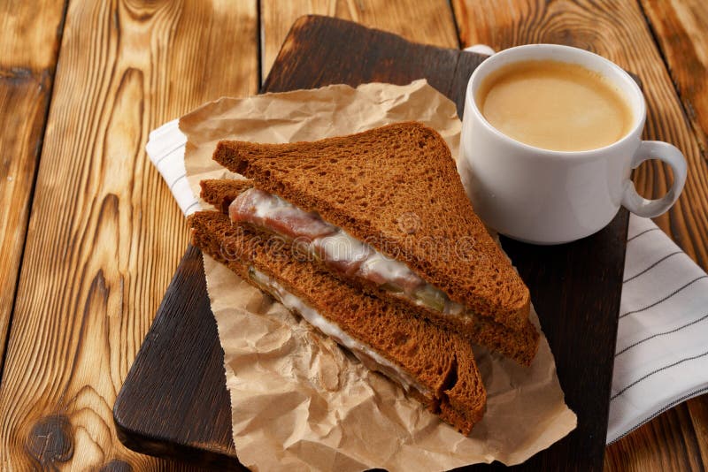 Toasted Rye Sandwich with Ham Cut into Halves on Table Stock Image ...