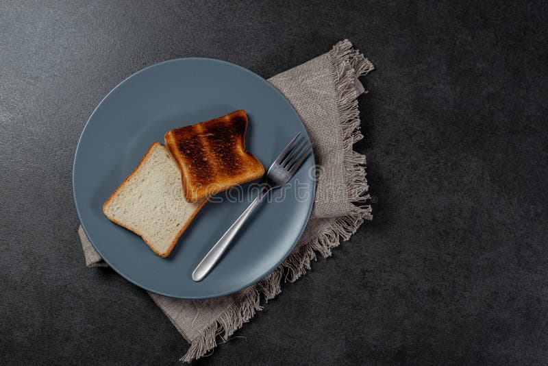 Toasted Slice of Bread on White Plate Stock Image - Image of plate ...