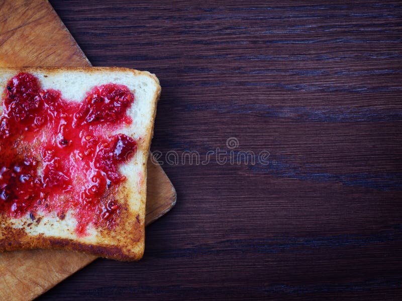 Toasted Toast with Raspberry Jam Stock Image - Image of bite, eating ...