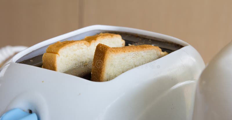 Toaster with bread slices stock image. Image of meal - 52680687