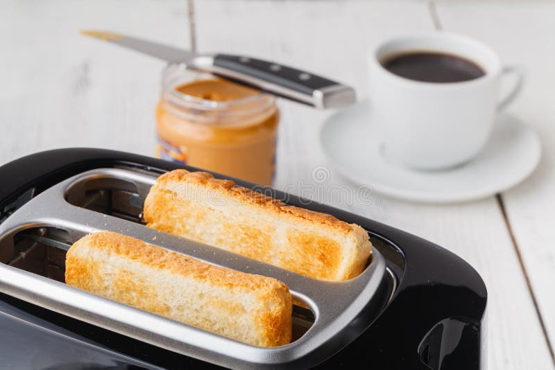 Toaster with Toasted Bread for Breakfast Inside Stock Photo - Image of ...