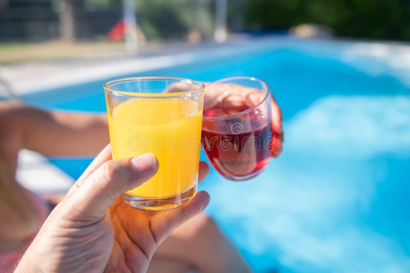 Drinks by pool stock photo. Image of drinks, glasses - 14263162