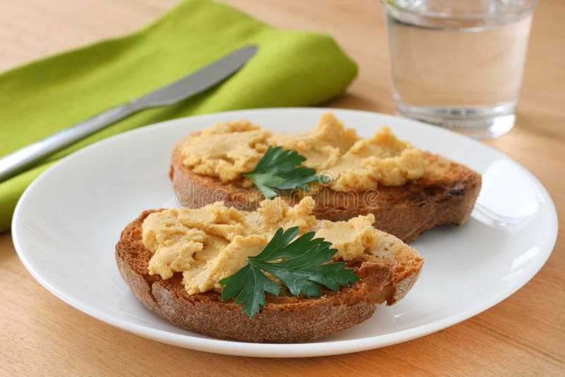 Toasts with hummus stock photo. Image of snack, mediterranean - 21726330