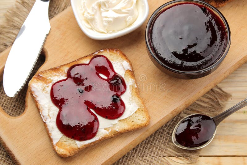 Toasts with Jam. Fried Crispy Toast with Red Jam on a Natural Wooden ...