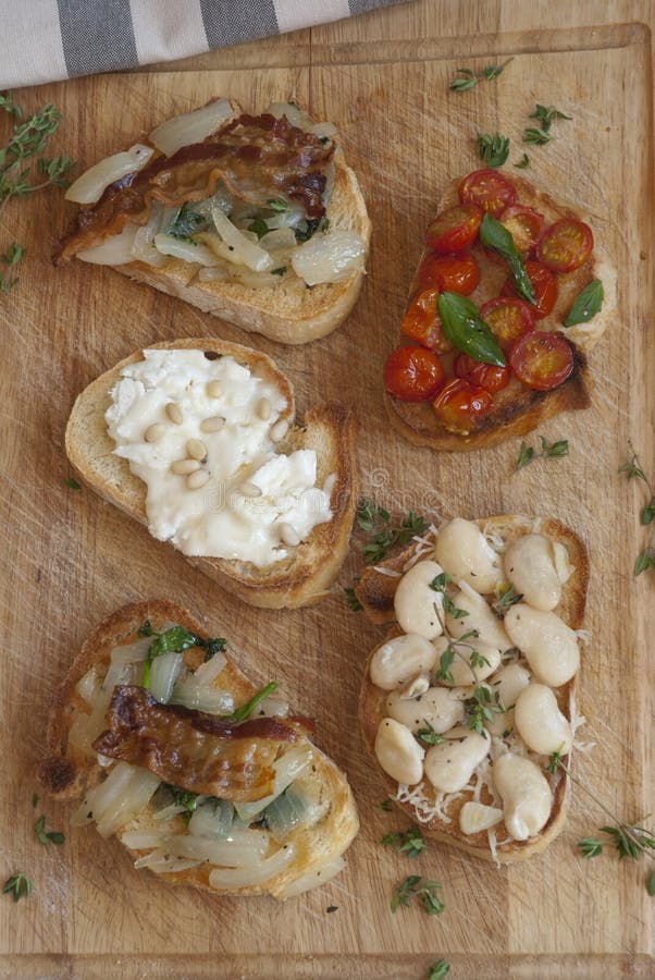 Toasts on wooden board stock photo. Image of roast, food - 19535032