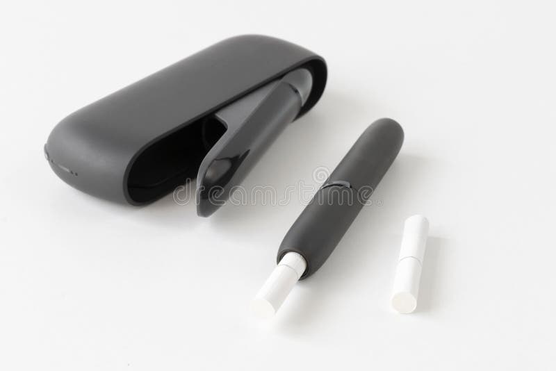 Tobacco Heating Device on a White Surface Stock Photo - Image of ...