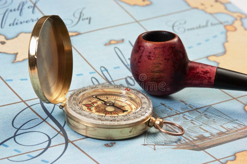 Tobacco Pipe and Compass on Map Stock Image - Image of cartographer ...