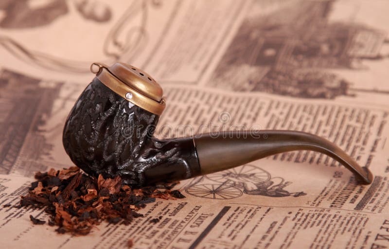 Tobacco pipe on old paper stock image. Image of pipe - 12010677