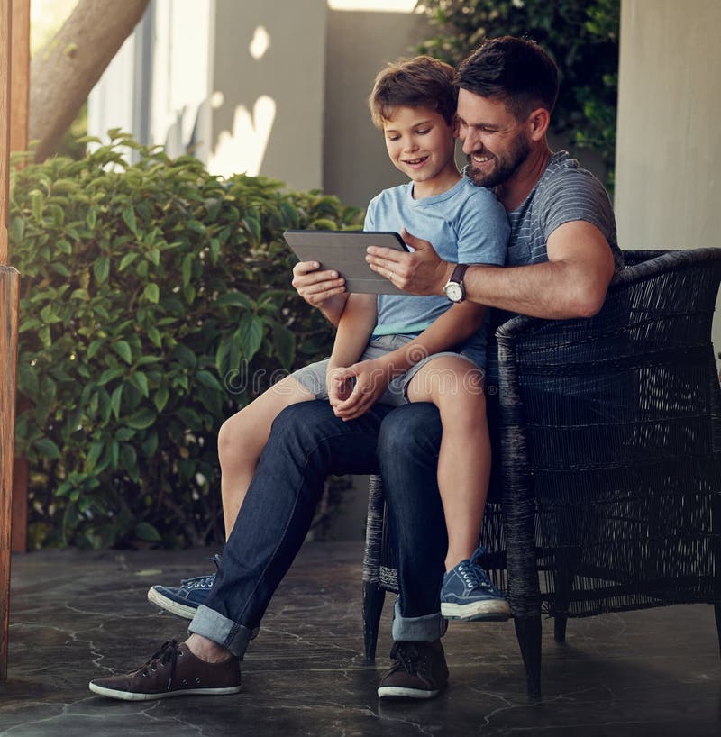 Today Im Going To Teach You about Technology. a Father and Son Using a ...