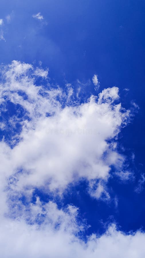 White Could and Blue Sky Over Land Stock Photo - Image of atmosphere ...