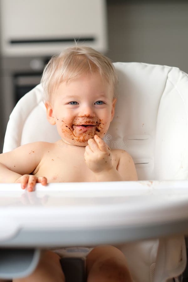 Toddler Baby Boy Child Eating Fruit with Dirty Messy Face Stock Image ... Toddler Baby Boy Child Eating Fruit with Dirty Messy Face Stock Image ...