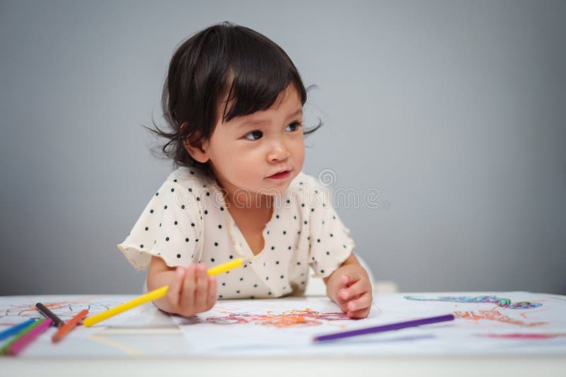Toddler Baby Playing and Training To Drawing with Colored Pencil on ...