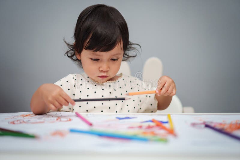 Toddler Baby Playing and Training To Drawing with Colored Pencil on ...