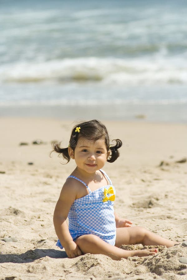 Toddler at Beach stock photo. Image of sand, bows, toddler - 5722684