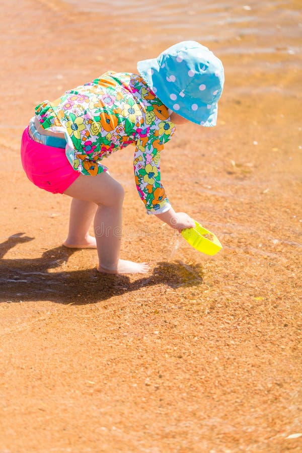 Toddler on the beach stock photo. Image of girl, beach - 88405986