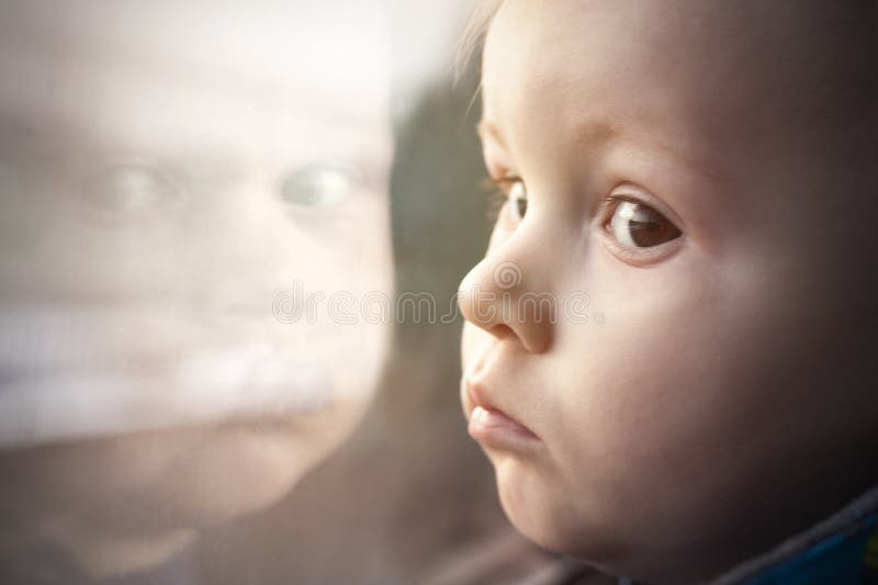 Toddler with Big Eyes in Reflection of Window. Stock Image - Image of ...