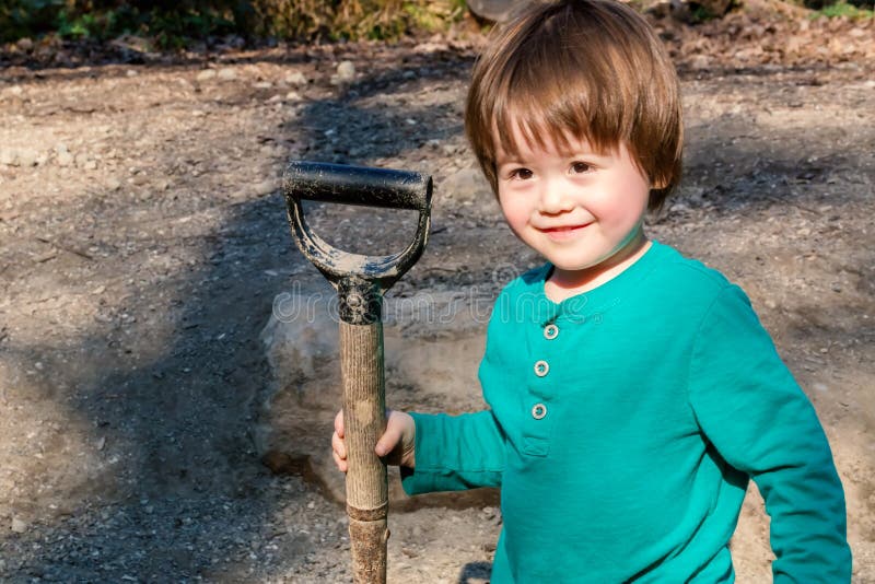 Toddler Boy Digging with a Shovel Stock Image - Image of oute, toddler ...