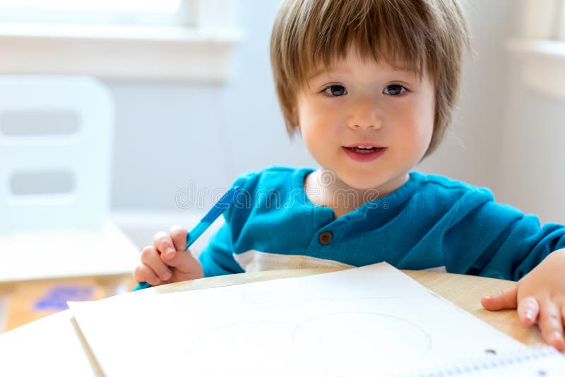 Toddler boy drawing stock photo. Image of cute, learning - 143527216