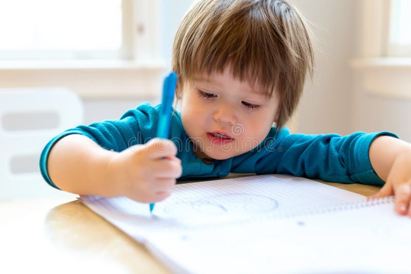 Toddler boy drawing stock photo. Image of people, learning - 145063786