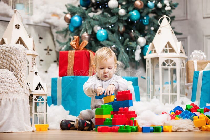 Toddler Boy Playing with Blocks at Christmas Tree Stock Photo - Image ...