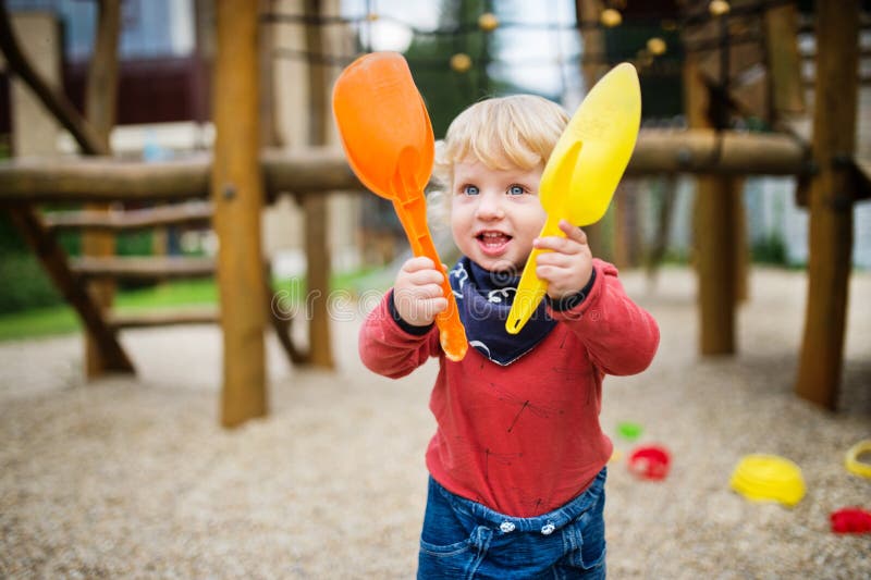 Toddler Boy Playing in the Playground, Summer Day. Stock Photo - Image ...